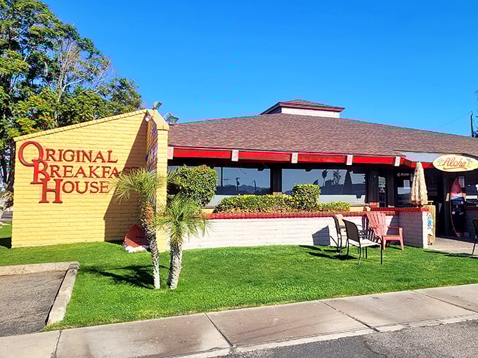That cheerful yellow sign and manicured lawn hint at the care that goes into every plate at Original Breakfast House.