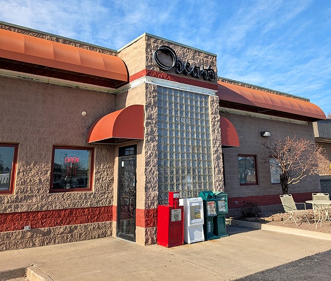 Morning light bathes Oscar's in a warm glow. Those red awnings have sheltered generations of hungry breakfast seekers.