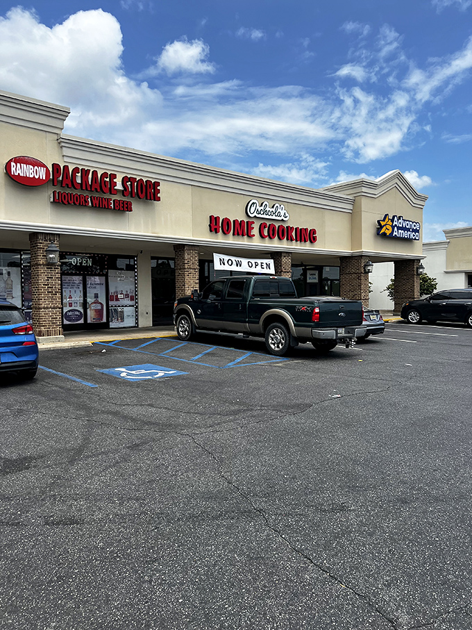 Oschcola's sits between a package store and other businesses, proving great chicken can thrive anywhere.