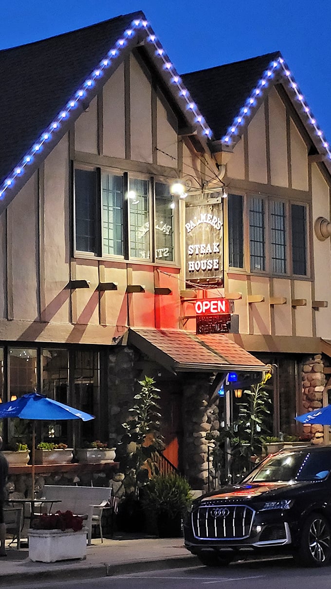 When blue lights trace a steakhouse roofline, you know you're in for something special. Meat magic happens after dark.