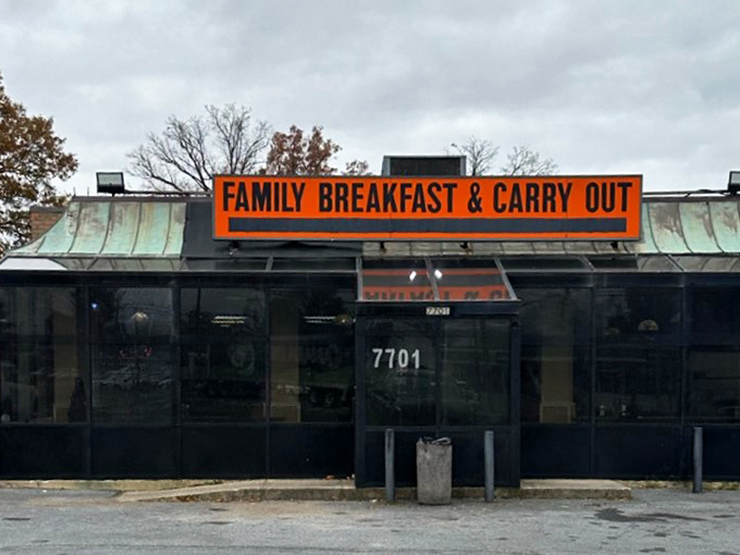The Pancake House announces its mission with refreshing directness. That orange sign means serious breakfast business inside.