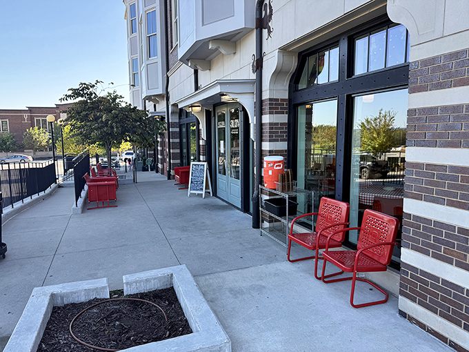 Those red chairs outside are practically saying, "Sit down, stay awhile." When pizza's this good, you'll want to.