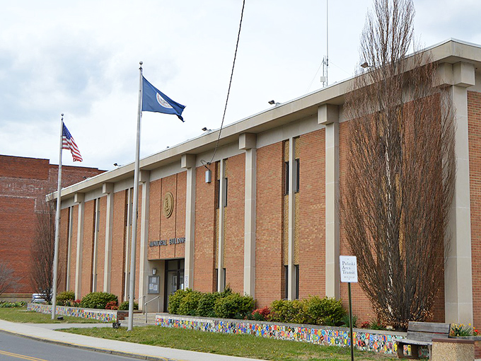 Pulaski&rsquo;s Municipal Building stands tall with its clean brick fa&ccedil;ade and proudly waving flags&mdash;an inviting landmark that reflects the town&rsquo;s welcoming charm and steady small-town spirit.