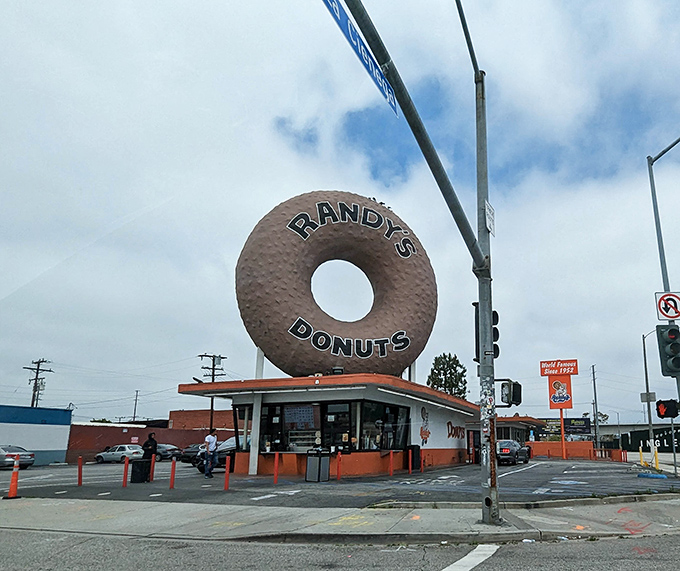 Randy's iconic rooftop donut has been calling to sweet-toothed travelers for generations of sugar seekers. 