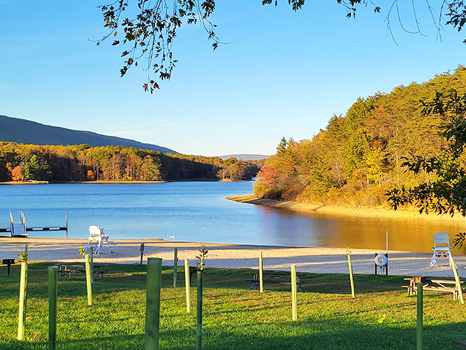 Fall colors frame Rocky Gap's beach like a painting. Bob Ross would add a "happy little tree" right about there.