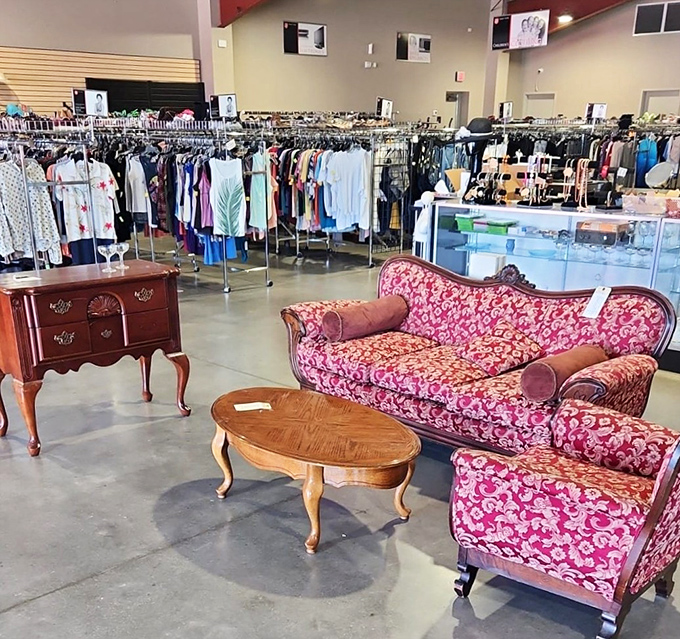 That damask sofa whispers stories of Sunday dinners while the wooden coffee table dreams of hosting game nights again.