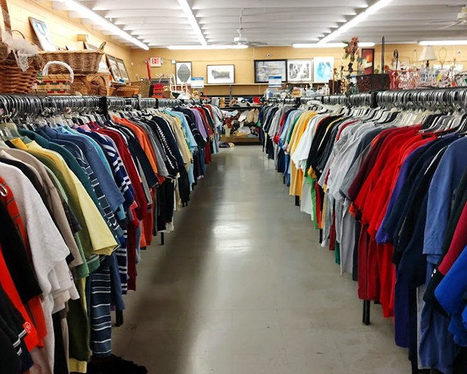 Racks upon colorful racks! Southern Thrift's clothing section stretches toward the horizon like a rainbow road of possibilities.