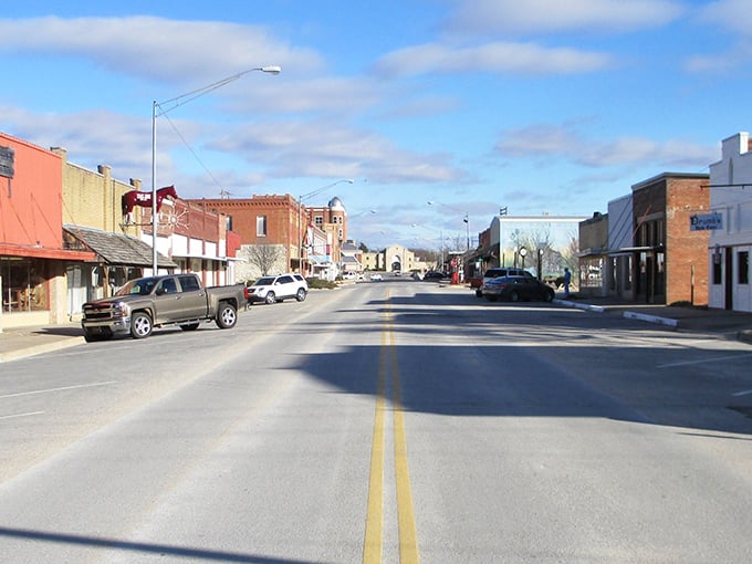 Main Street Sulphur: Where brick buildings stand proud, pickup trucks rule the road, and nobody's in a hurry to get anywhere important.