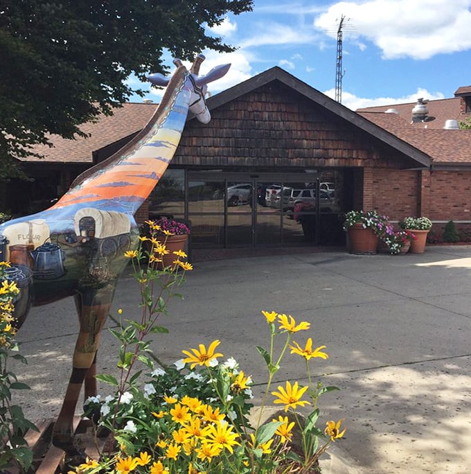 Colorful statues guard the entrance like friendly sentries welcoming you to beef paradise just off the Indiana highway.