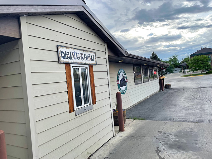 Yellowstone Sandwich Company's simple storefront with drive-thru window&mdash;where convenience meets unexpectedly delicious creations.