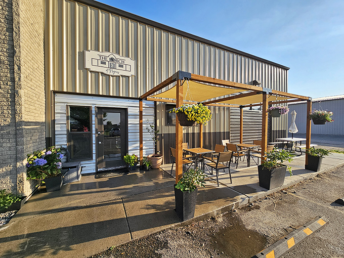 That inviting porch and those flower pots promise a meal worth remembering in little Manhattan.
