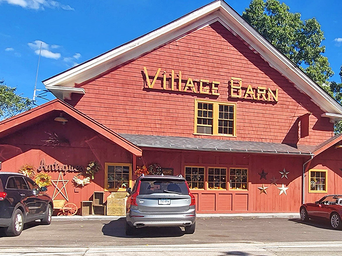 Sunny days make the Village Barn's classic red siding pop like it's showing off for the camera.