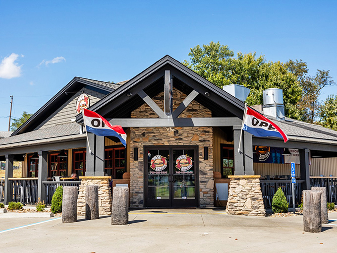 Stone and timber come together like a handshake between rustic charm and modern comfort, which is exactly what you want when burger cravings strike.