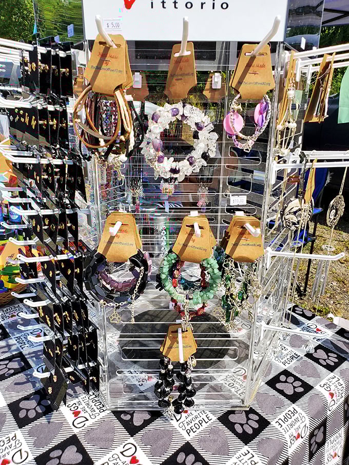 Handcrafted jewelry displays showcase colorful stone bracelets and beaded necklaces &ndash; wearable art that carries the energy of its creator.