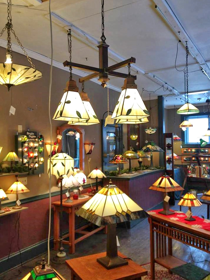 Stepping into Adirondack Stained Glass Works feels like entering a kaleidoscope, where artisanal craftsmanship transforms light into liquid color.