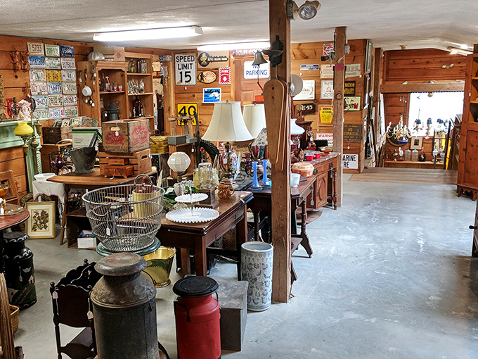 Vintage signs and weathered wood create the perfect backdrop for treasures that survived decades of spring cleanings and estate sales.