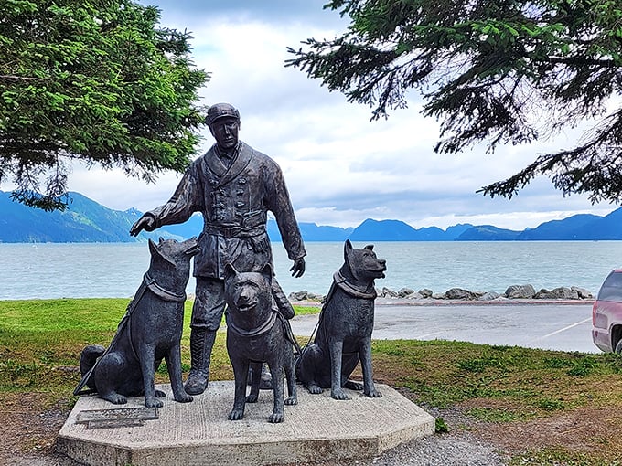 This bronze tribute to Iditarod legend Alfred Lowell and his faithful companions proves that in Alaska, even the statues have better views than most people's vacation photos.