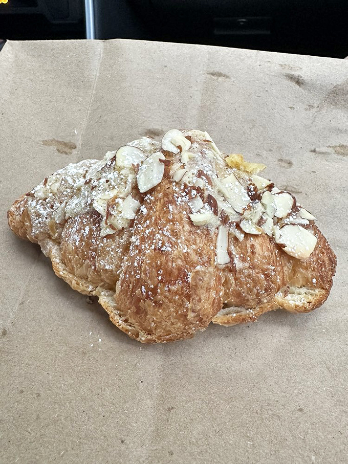 The almond croissant—a humble-looking superstar dusted with powdered sugar and studded with sliced almonds. Worth crossing state lines for.