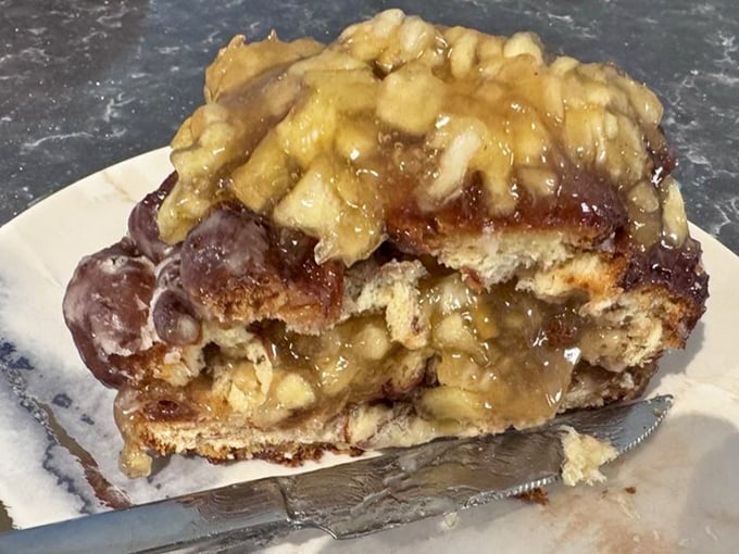 Not just a fritter – it's an architectural marvel of apple, cinnamon, and glaze that would make Frank Lloyd Wright weep with joy.