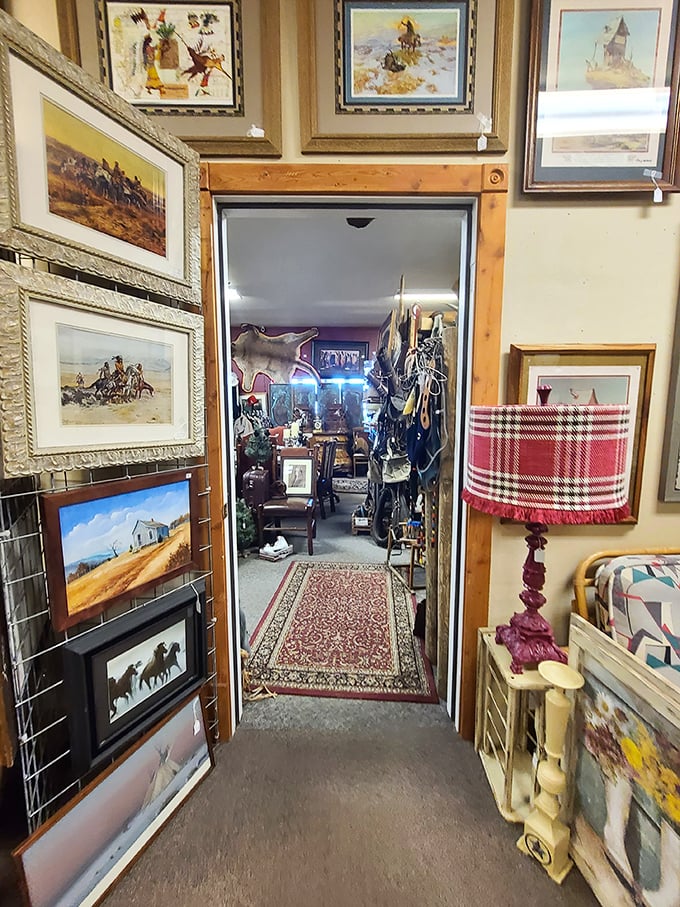 Western art lines the pathway to more treasures. That carpet runner feels like the red carpet treatment for antique enthusiasts.