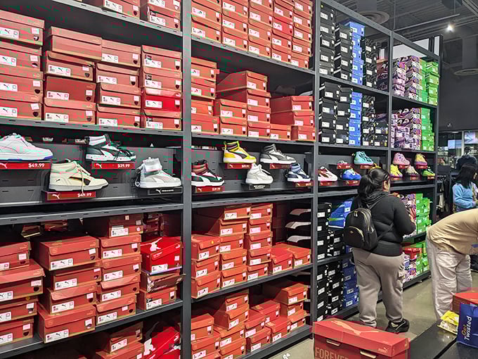 Sneakerheads, rejoice! This wall of athletic footwear offers last season's must-haves at prices that won't require selling your car to afford them.