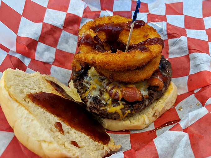 This isn't just a burger&mdash;it's architecture. The onion ring crown makes it royalty among sandwiches, demanding both respect and napkins.
