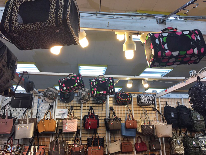 Bag heaven exists, and it's hanging from the ceiling. Like a chandelier of accessories, these purses dangle with promises of organized tomorrows. 
