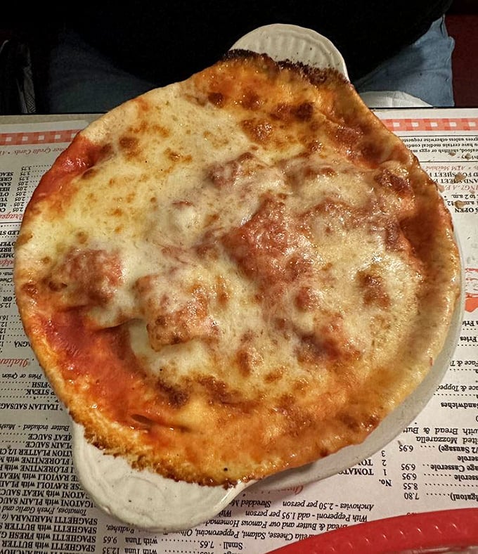 The perfect cheese pizza isn't just a myth. At Luigi's, it's a thin-crust reality with that ideal sauce-to-cheese ratio that haunts your dreams.