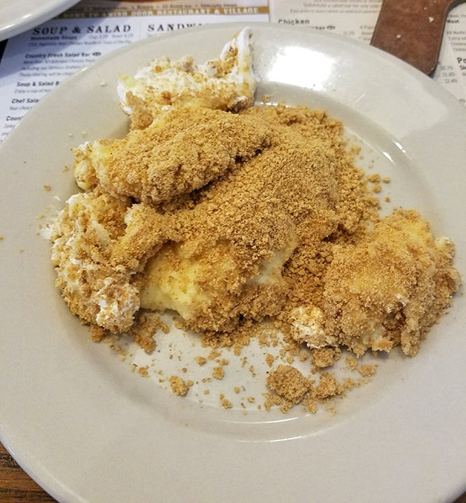 Banana pudding with that perfect crumble topping—the kind of dessert that makes you consider licking the plate when nobody's looking.