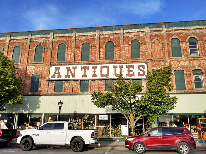 That "ANTIQUES" sign isn't lying &ndash; inside waits a treasure hunt where patience beats algorithms every time.
