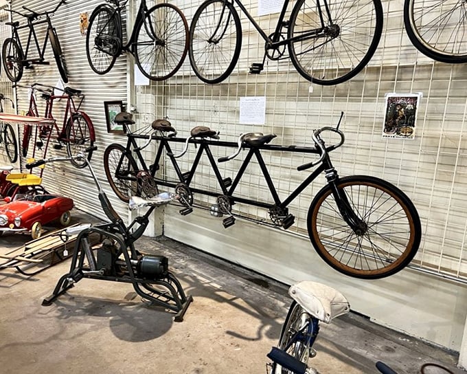 The bicycle wall showcases the evolution of two-wheeled transportation, including this tandem that probably tested more relationships than a cross-country road trip.