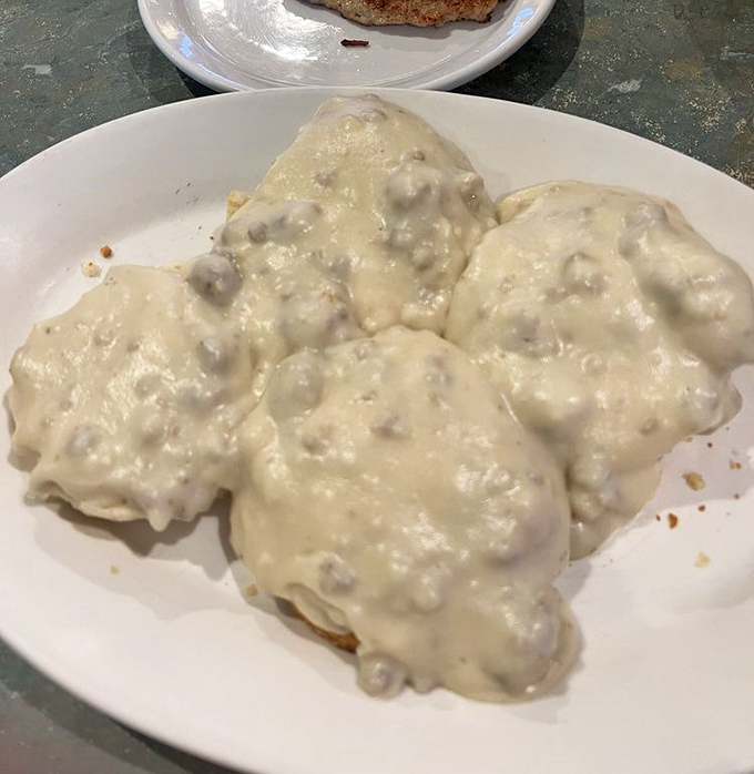 These biscuits and gravy aren't just a breakfast &ndash; they're an edible hug. The sausage-studded gravy blankets each biscuit with comforting warmth.