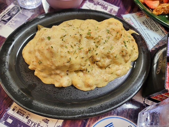 Not your average school cafeteria fare. This creamy, peppery masterpiece is what biscuits dream of being smothered in when they grow up.