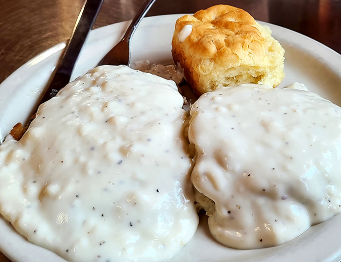 These biscuits swimming in peppery gravy prove that some of life's greatest pleasures come smothered in creamy, delicious comfort.