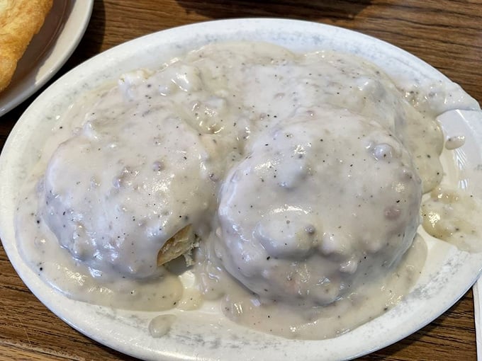 These biscuits drowning in sausage gravy could convince even the strictest diet enthusiast to take a well-deserved cheat day.
