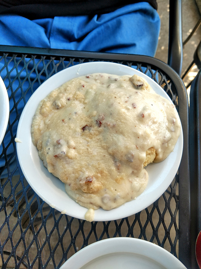 Not all heroes wear capes; some wear gravy. This biscuit didn't just get covered, it got smothered with breakfast love.