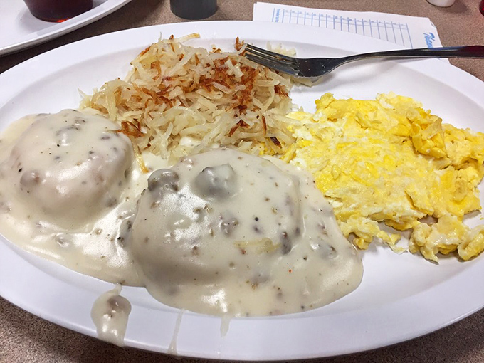 When biscuits and gravy arrive looking this magnificent, you understand why people drive an hour just to experience this particular plate of happiness.