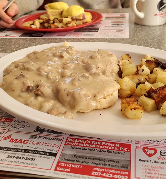 Biscuits and gravy: the breakfast equivalent of a warm hug from your favorite aunt. Those home fries are playing the perfect supporting role.