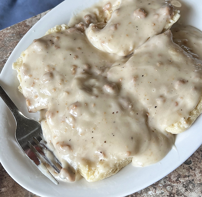 Biscuits and gravy so authentic they should come with their own birth certificate. That pepper-speckled gravy is the security blanket your taste buds never knew they needed.