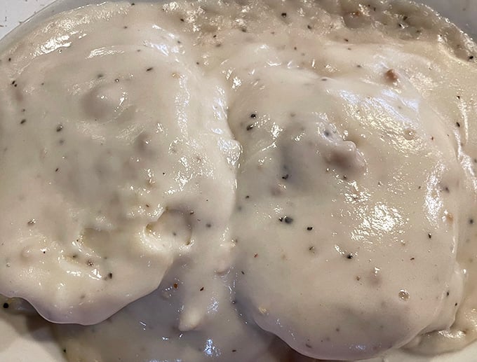 Biscuits swimming in creamy, pepper-flecked gravy – the kind of breakfast that makes you want to buy a rocking chair and speak in aphorisms.