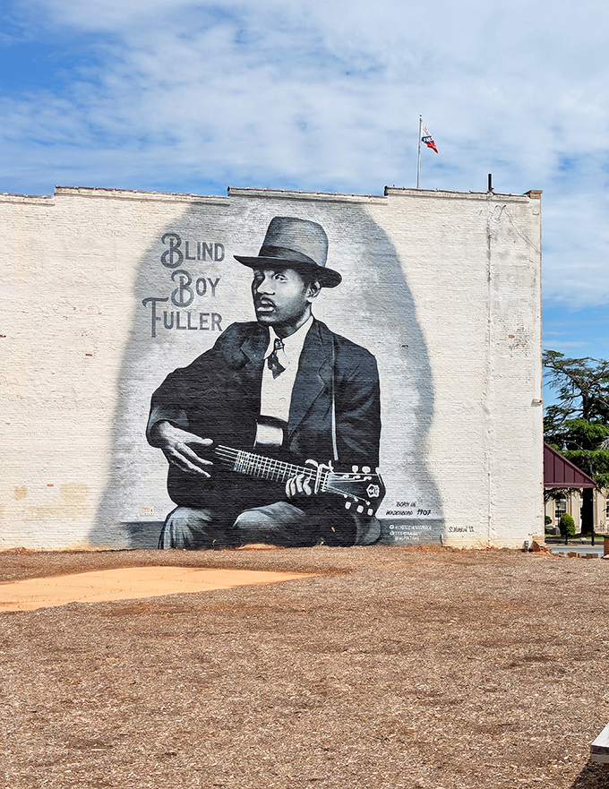 Blind Boy Fuller watches over Wadesboro, his painted presence reminding us that sometimes the greatest cultural treasures come from the smallest towns.