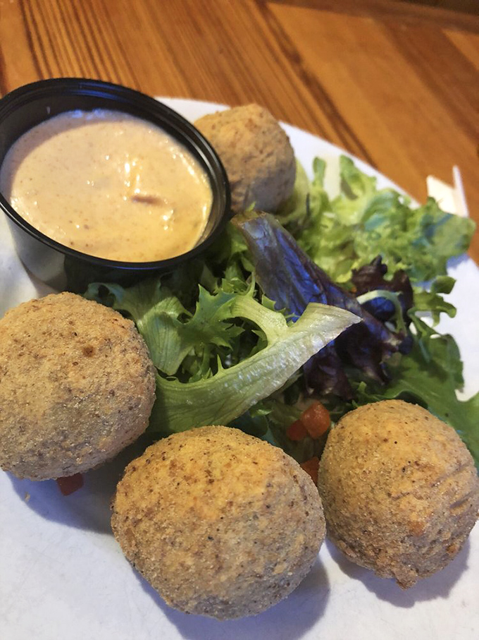 These boudin balls aren't just appetizers; they're ambassadors of Cajun cuisine, crispy on the outside with a savory treasure waiting inside.