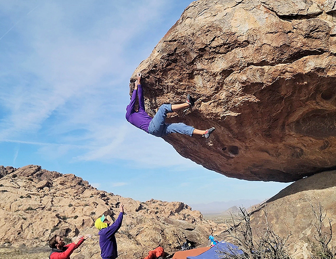 Defying gravity with chalk-dusted fingers! Rock climbers from around the world flock to Hueco Tanks for what they call "the best bouldering problems" on the planet.