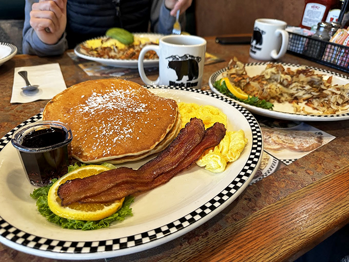 Pancakes the size of small frisbees, bacon cooked to that perfect crisp-chewy balance, and eggs that actually taste like eggs should.
