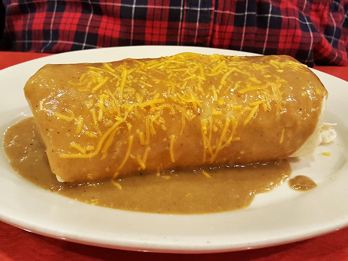 This breakfast burrito isn't just wrapped&mdash;it's embraced by a tortilla and smothered with love. Cheese-topped comfort that requires both hands and zero shame.