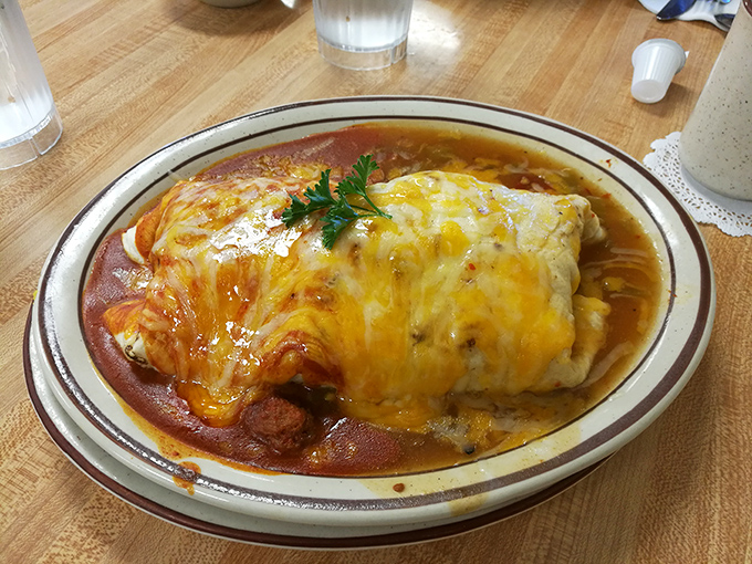 This breakfast burrito isn't just food&mdash;it's New Mexico's answer to "What if happiness were portable?" Melted cheese cascading over chile sauce.