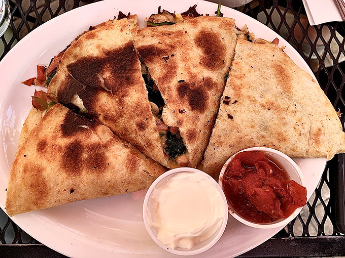 The breakfast quesadilla &ndash; where tortillas go to fulfill their destiny. Crispy, cheesy perfection with salsa that wakes up your taste buds.