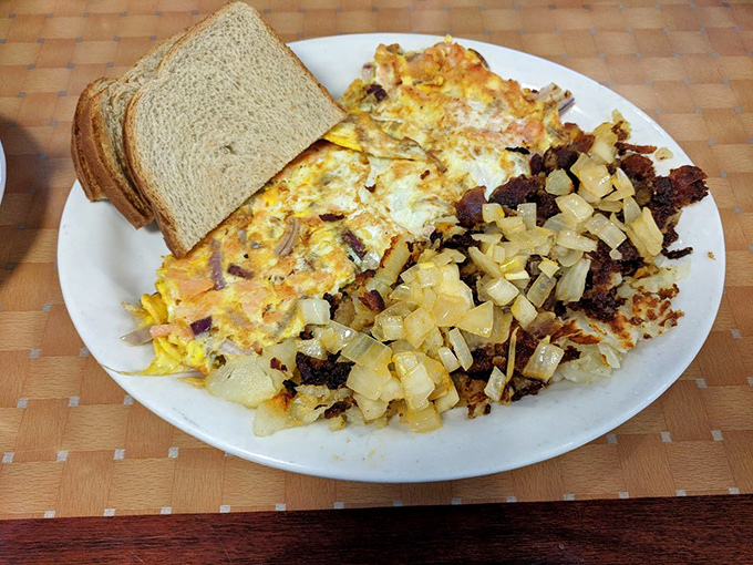 Breakfast perfection on a plate &ndash; where the omelet meets home fries in a morning marriage that's lasted longer than most Hollywood relationships.