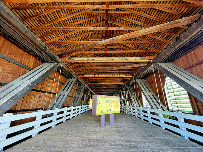 Look up! The intricate wooden skeleton of the bridge reveals the architectural equivalent of grandma's handmade quilt—practical, beautiful, and built to last generations.