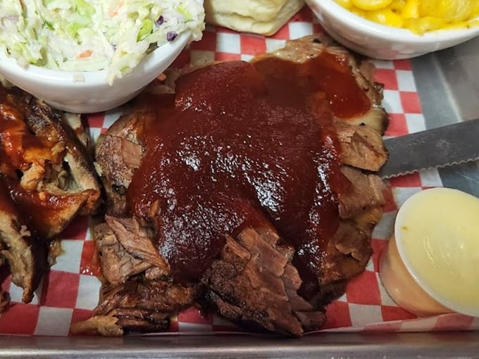 Brisket so tender it surrenders to your fork without a fight, slathered in house BBQ sauce that would make a Texan tip their hat.